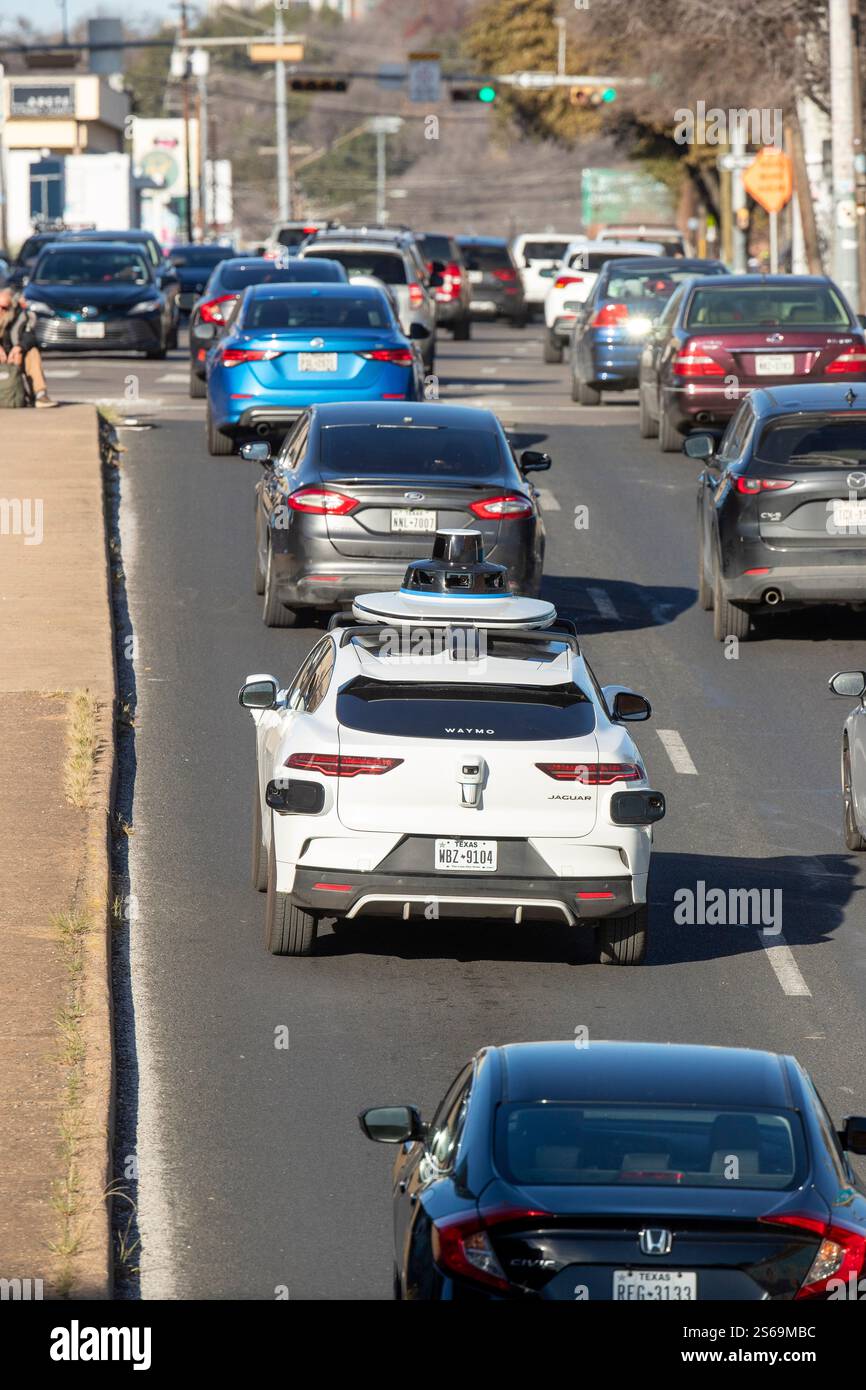 Waymo self-driving cars like this one are a common sight in the streets ...