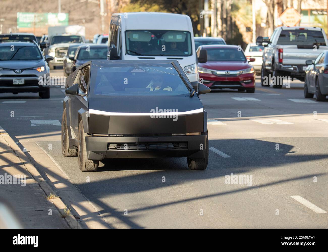 A Cybertruck made by local car manufacturer Tesla drives south on Lamar ...