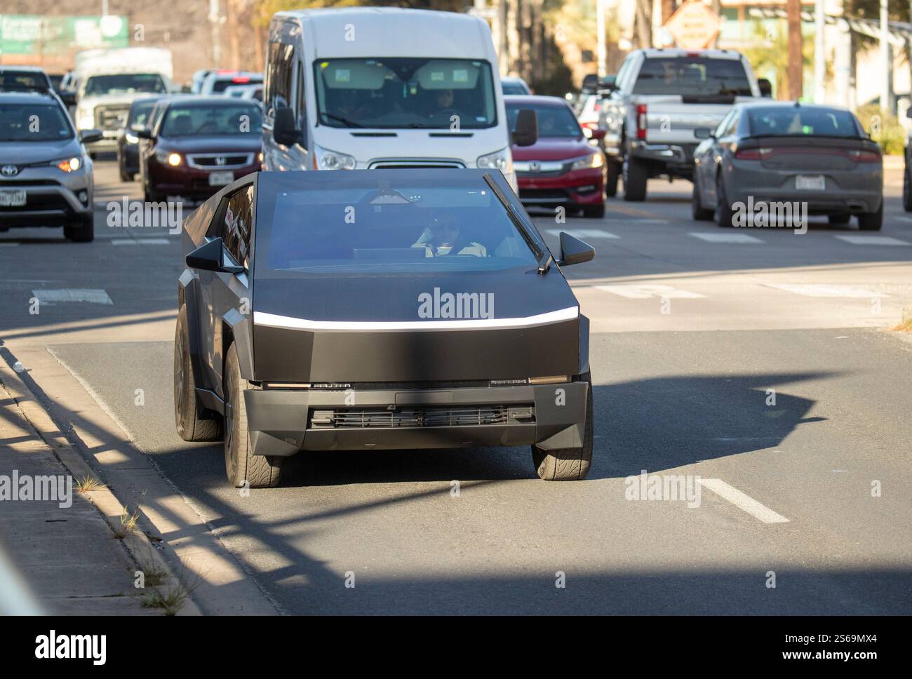 A Cybertruck made by local car manufacturer Tesla drives south on Lamar ...