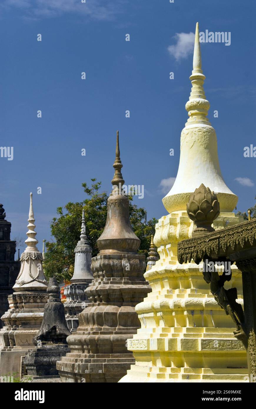 Small stupas mark graves at Buddhist monastery Wat Dam Nak; today home ...