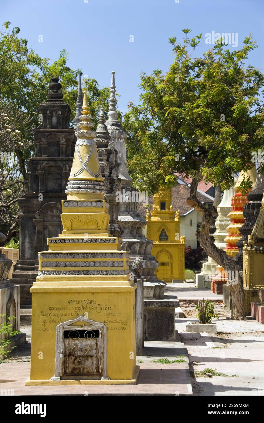 Small stupas mark graves at Buddhist monastery Wat Dam Nak; today home ...