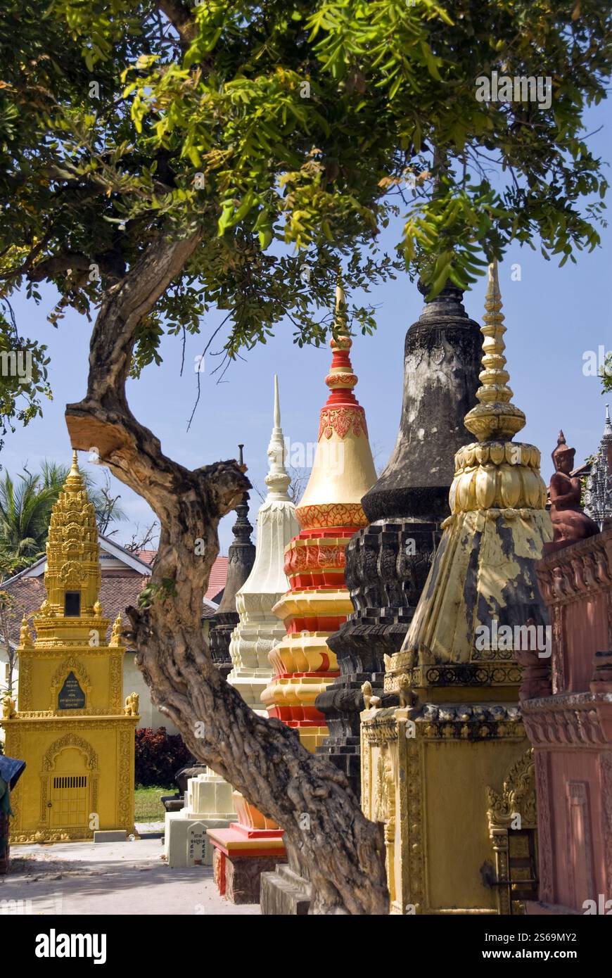 Small stupas mark graves at Buddhist monastery Wat Dam Nak; today home ...