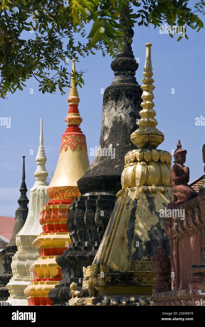 Small stupas mark graves at Buddhist monastery Wat Dam Nak; today home ...