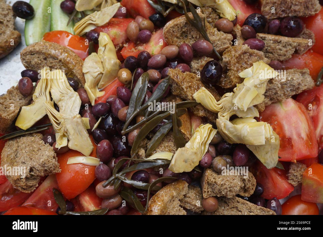 A traditional greek village salad with tomatoes, cucumbers, cretan ...