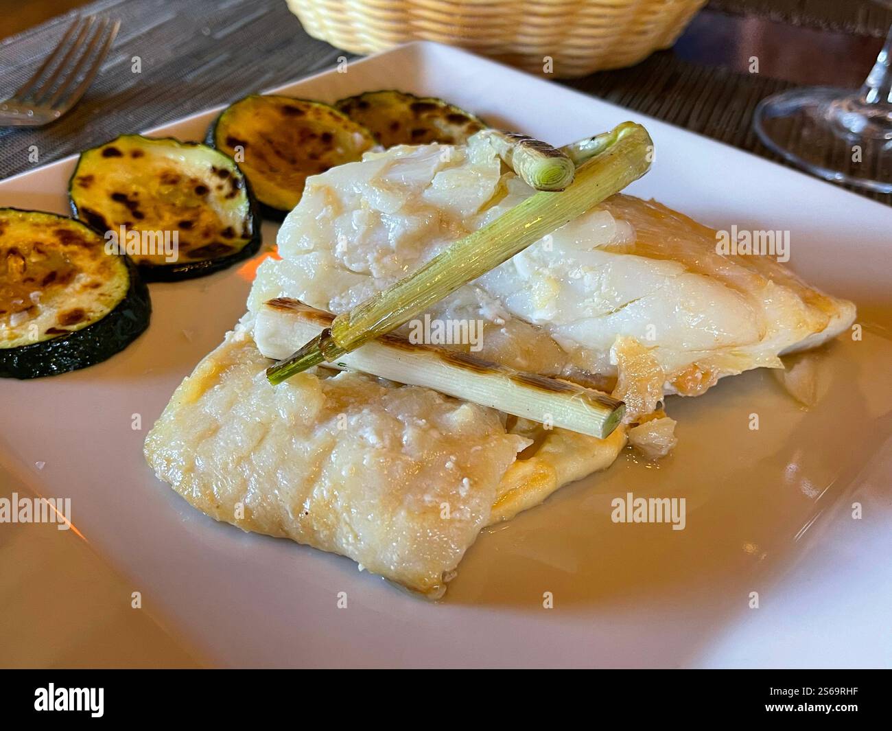 Grilled cod loin with vegetables. Spain Stock Photo - Alamy
