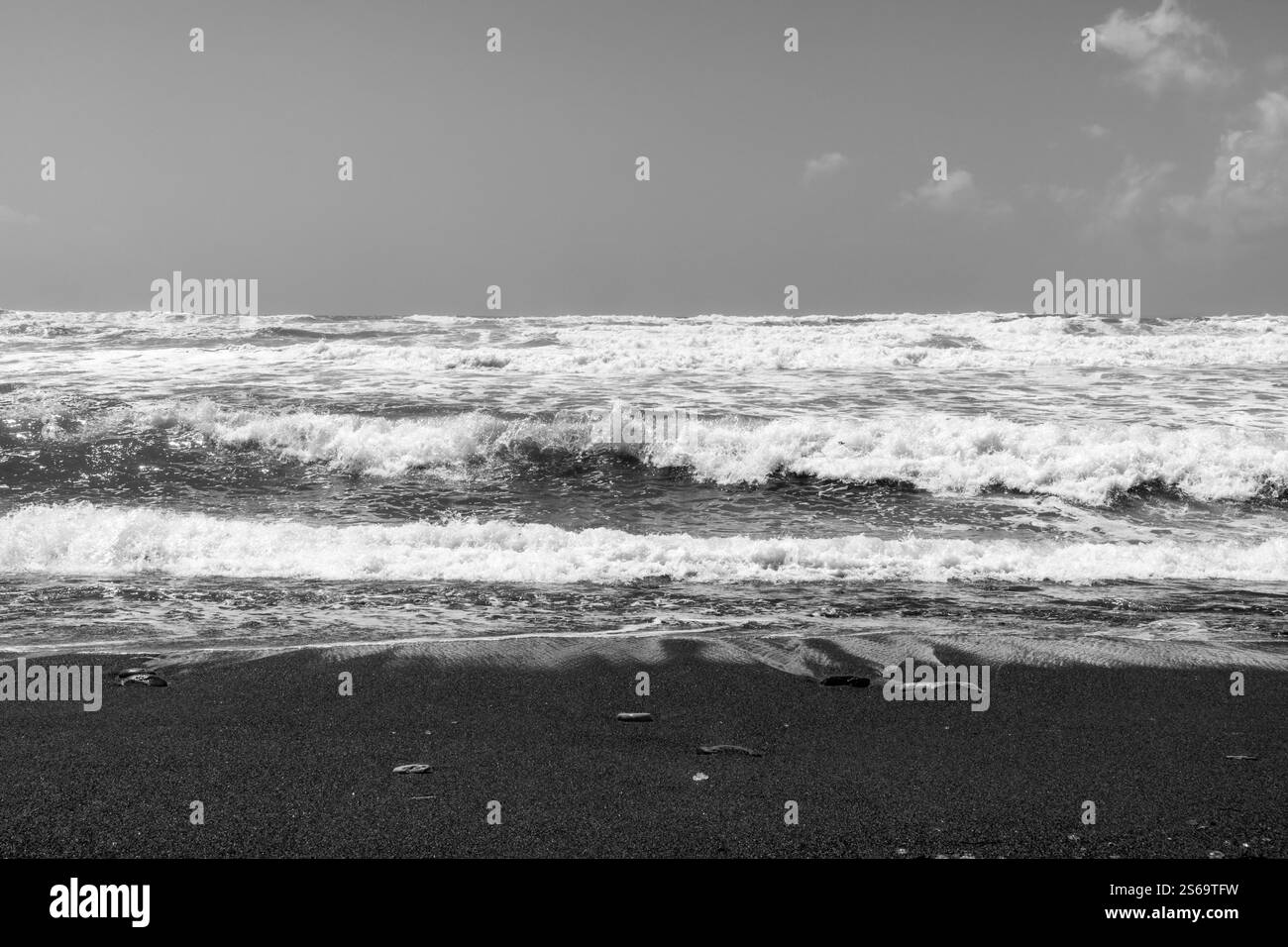 Powerful waves in stormy ocean seen from sandy beach of Atlantic coast ...