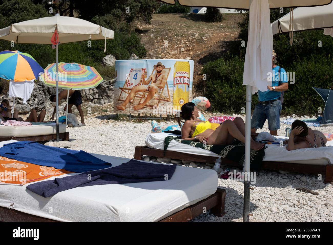 Advert for Ožujsko, Croatian lager beer brand, on a beach in the Pula ...