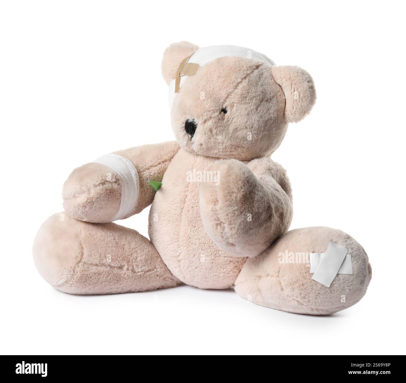 Teddy bear with bandages, adhesive medical plasters and thermometer ...