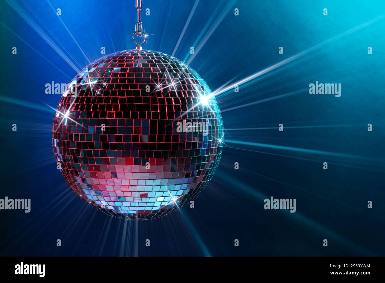 Disco ball reflecting light on colorful background. Nightclub decor ...