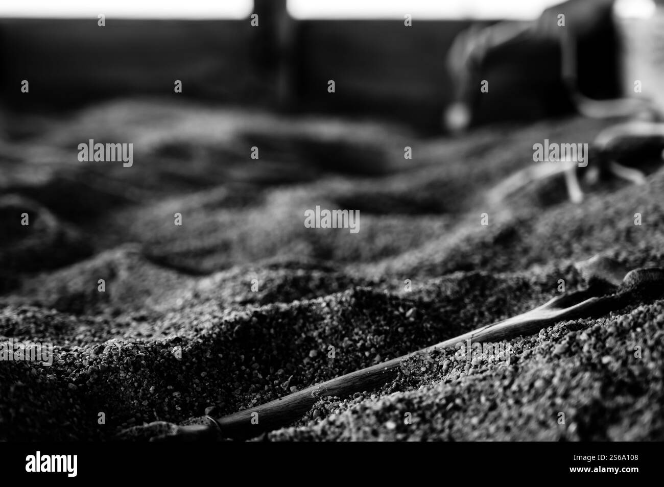 Dig into the sand Black and White Stock Photos & Images - Alamy