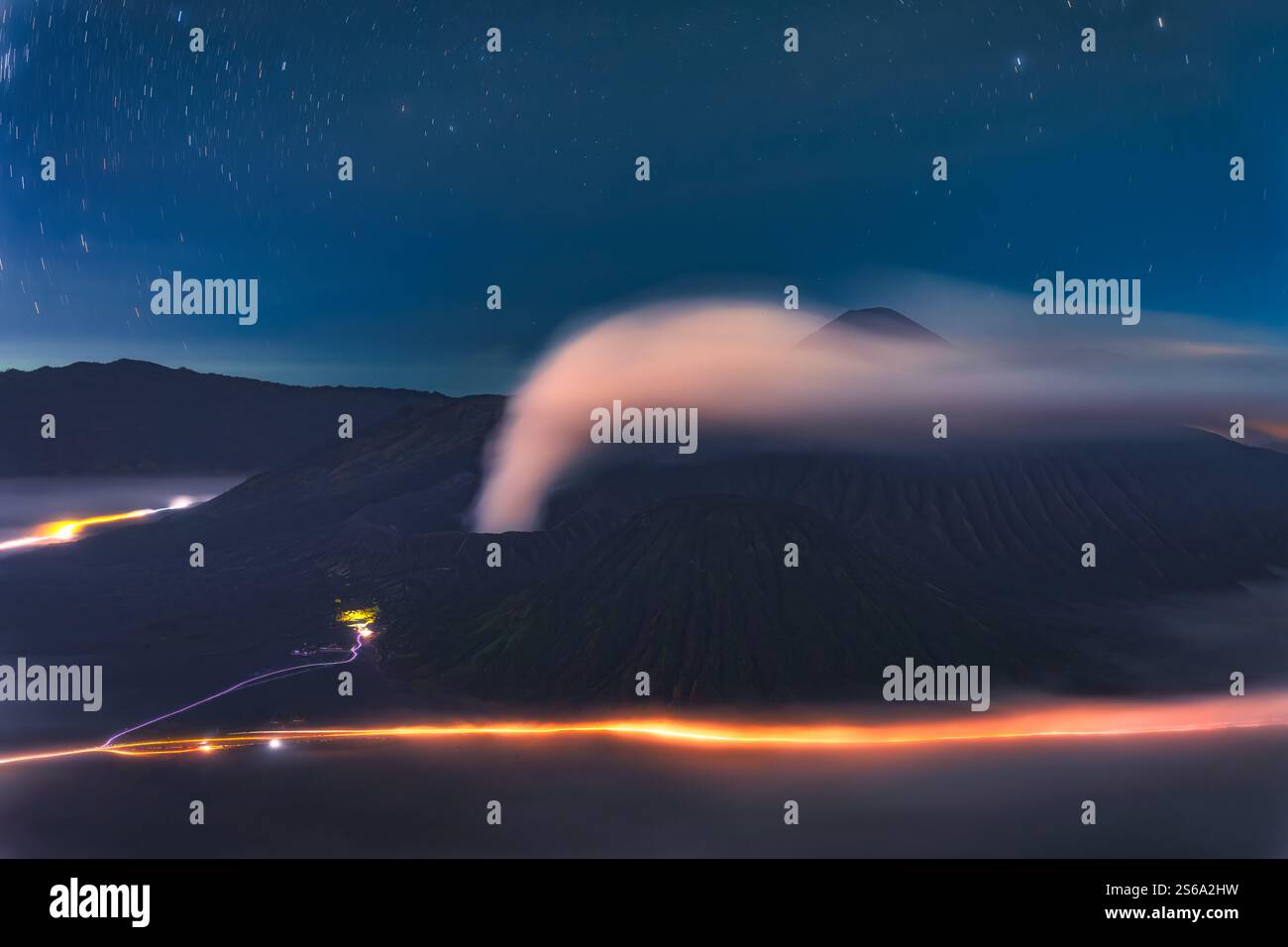 Experience mesmerizing volcanic activity under a starry sky, surrounded ...