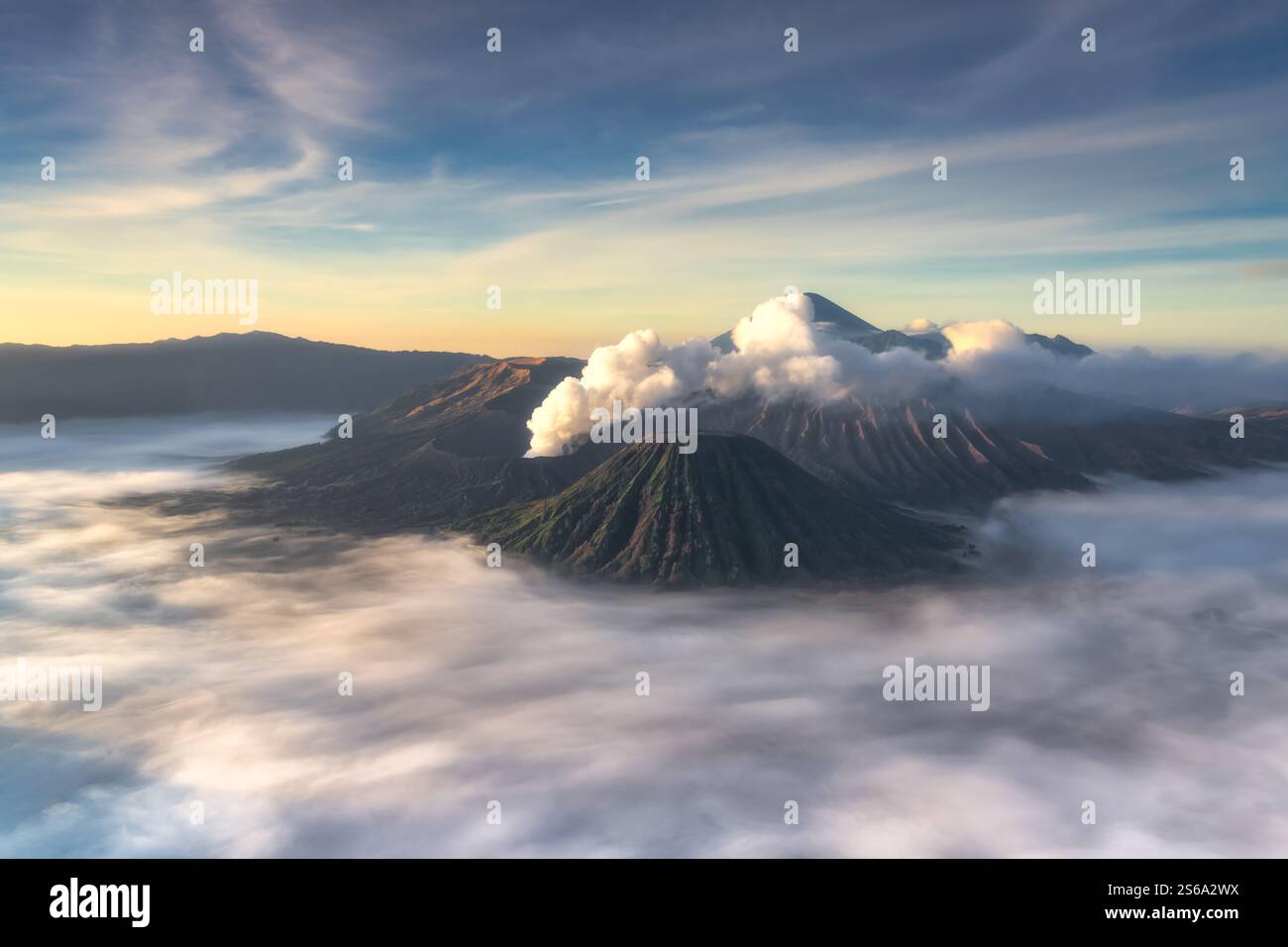 A breathtaking aerial view showcases a stunning Bromo volcano shrouded ...