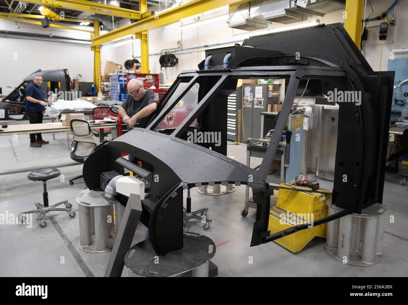Montreal, Canada. 14th Jan, 2025. An employee works on a helicopter ...