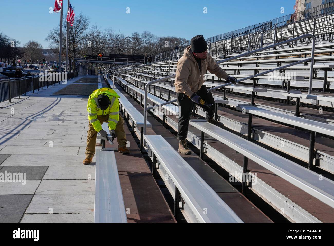 FILE - mWorkers continue construction on bleachers at Freedom Plaza ...