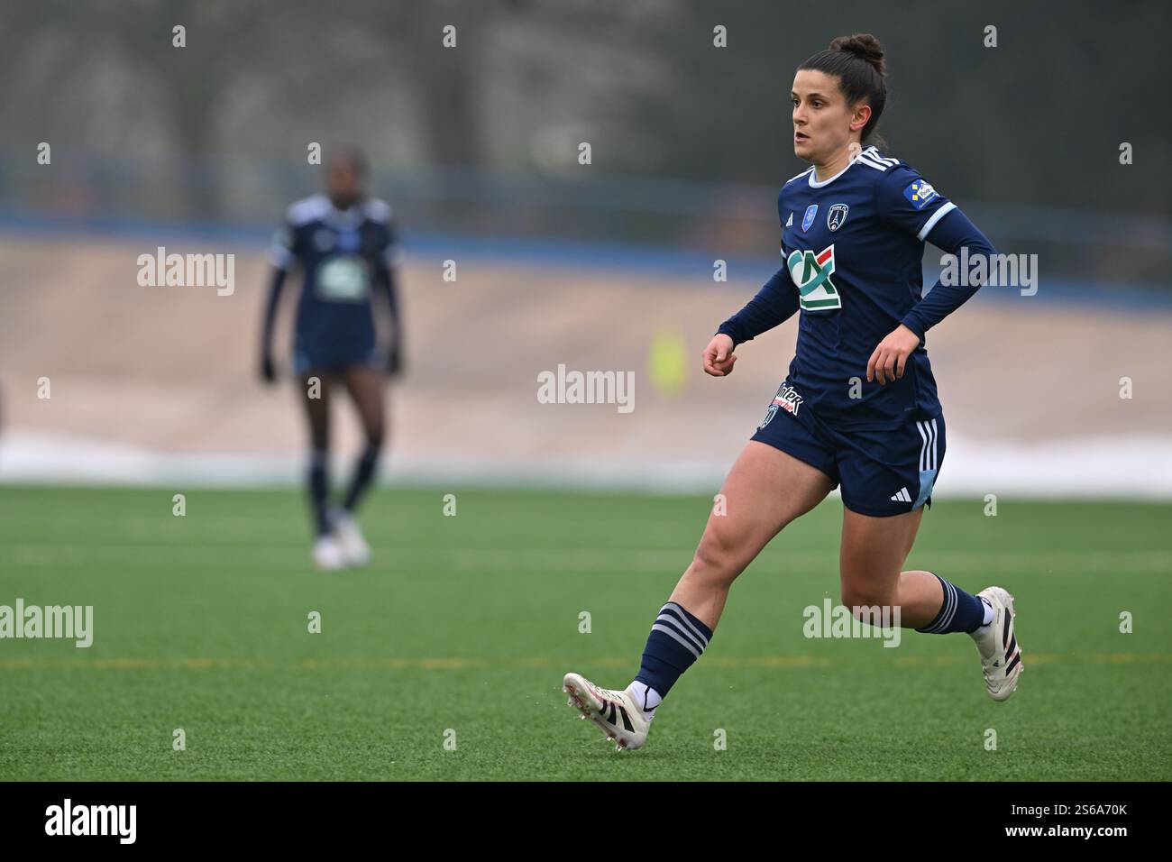 Roubaix, France. 15th Jan, 2025. Mathilde Bourdieu (9) of Paris FC ...