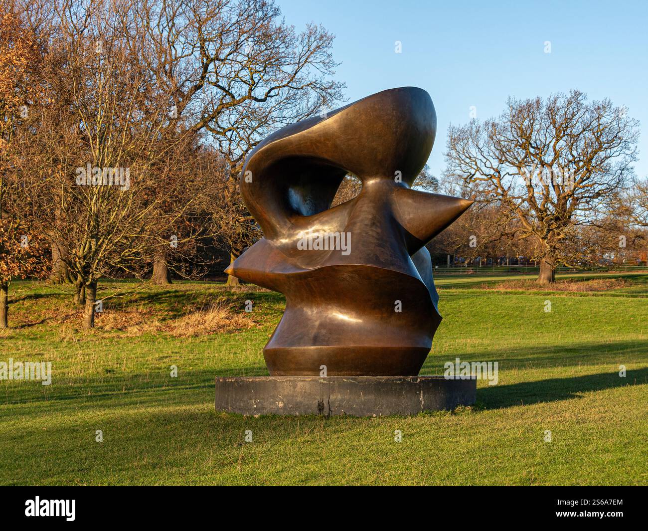 Large Spindle Piece by Henry Moore. Large bronze sculpture seen against ...