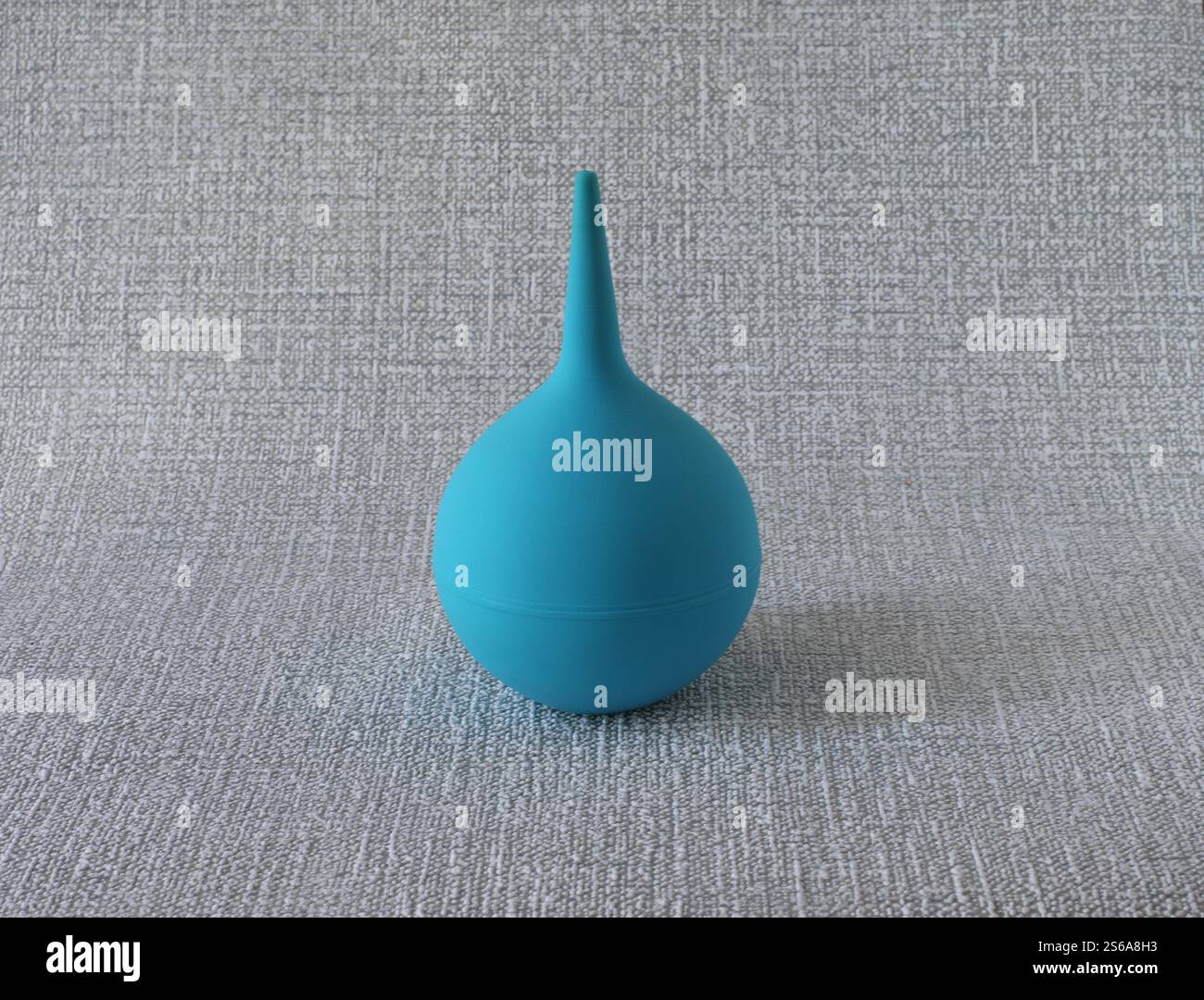 An image of a blue medical syringe in a vertical arrangement Stock ...