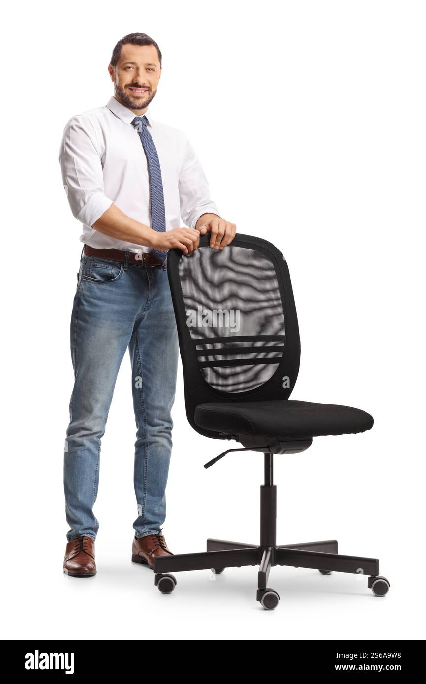 Businessman standing behind an office chair isolated on white ...