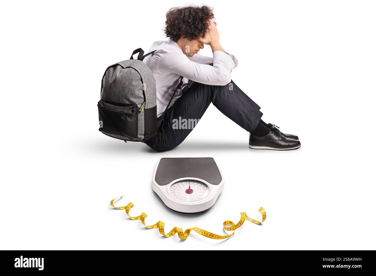 Male student worried about his weight isolated on white background ...