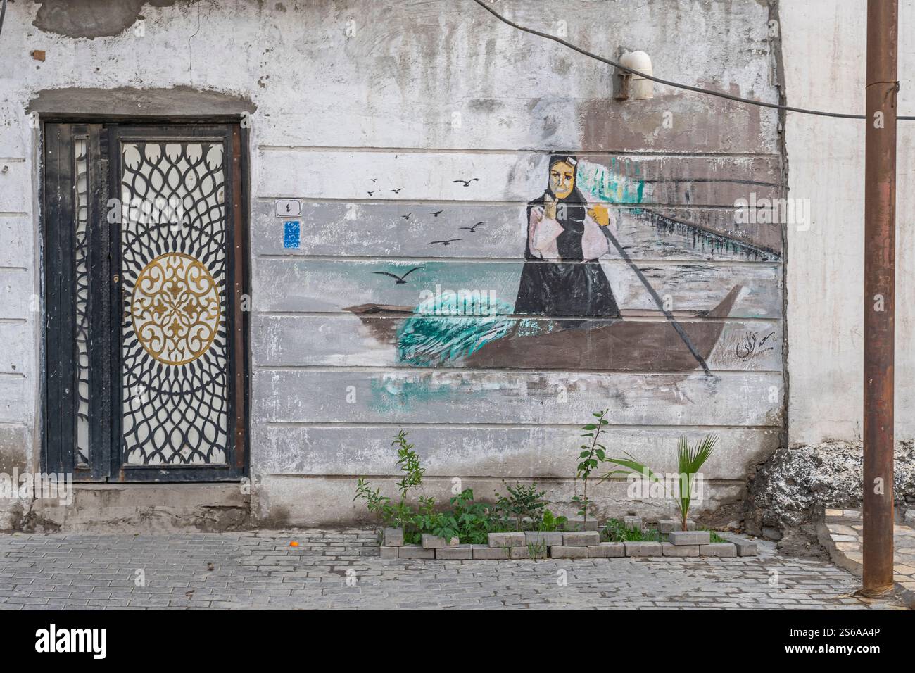 Beautiful colorful wall painting around side of street in Basrah, Iraq ...
