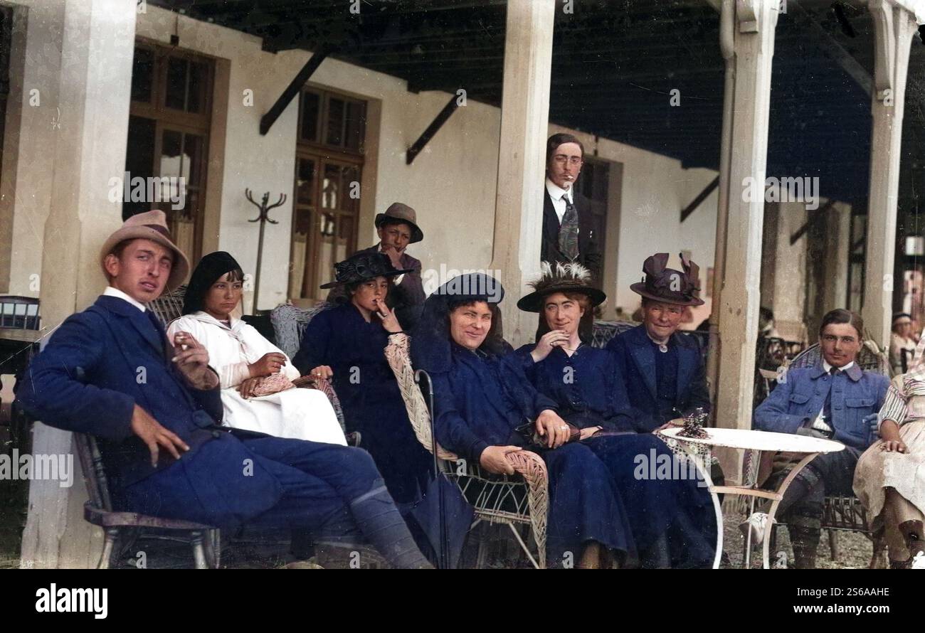 French family and friends smoking outside bar cafe in rural France 1920 ...