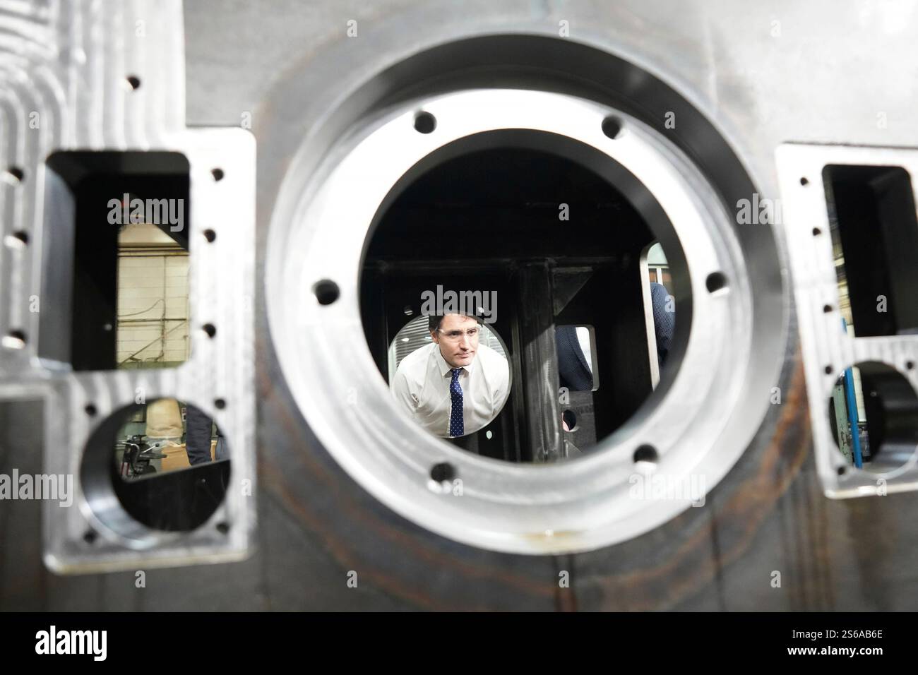 Canada Prime Minister Justin Trudeau looks at fabrication steel product ...