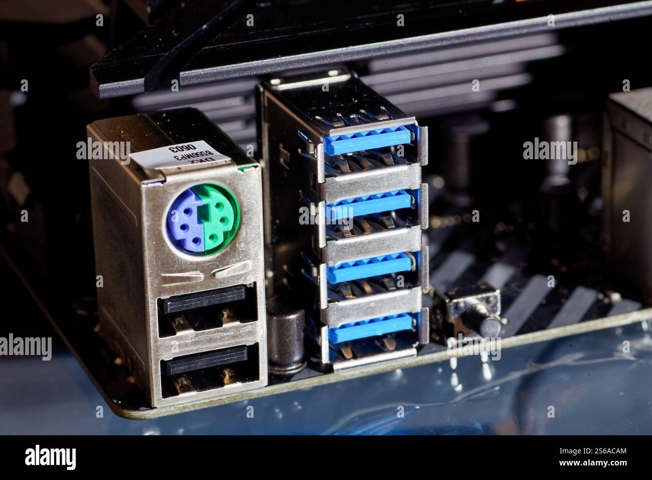 A detailed close-up view of USB and PS 2 ports on a computer ...
