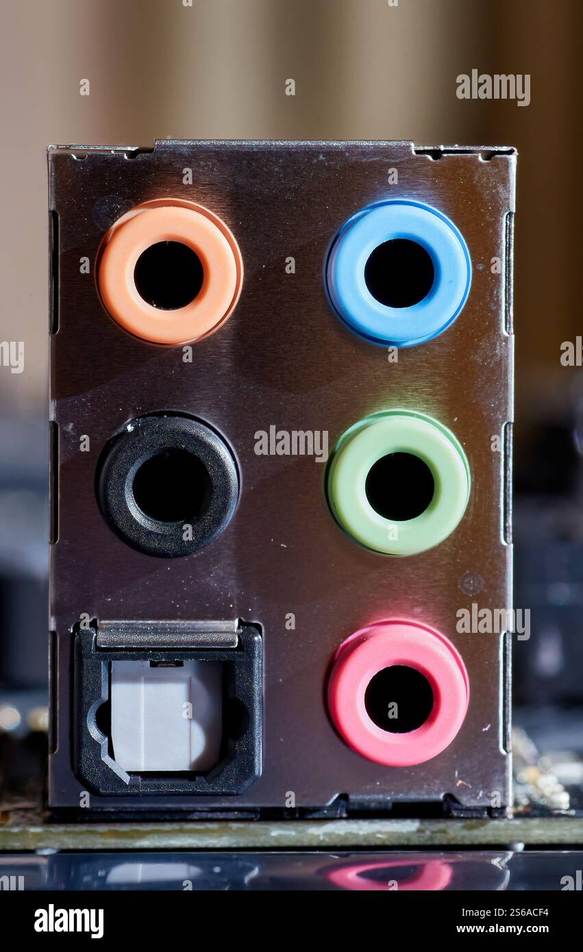 A close-up image of colored audio ports on a computer motherboard ...