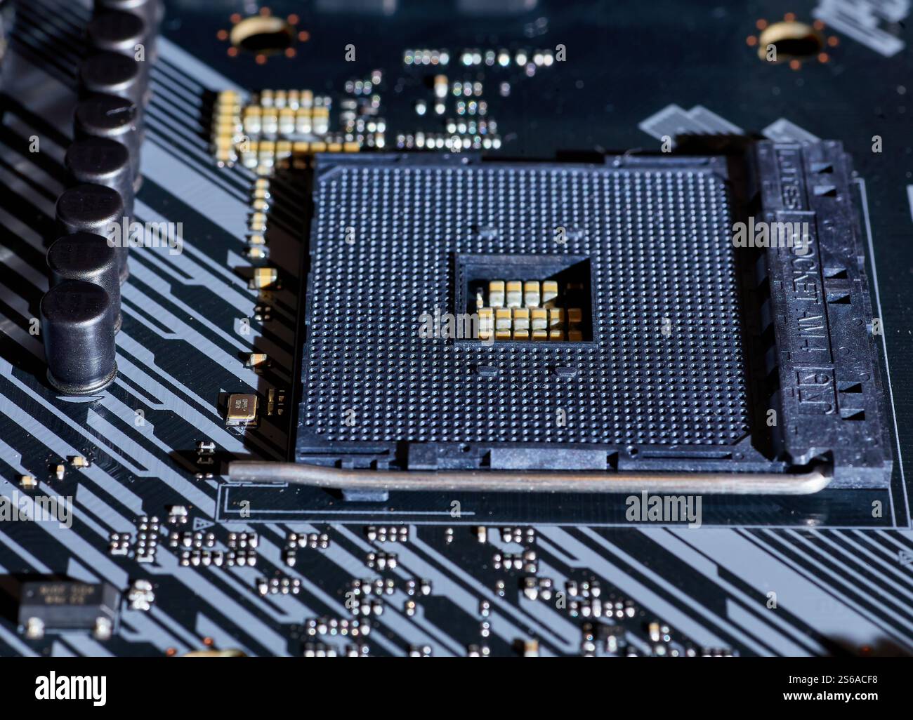 A close-up view of an AM4 CPU socket on a motherboard. This detailed ...