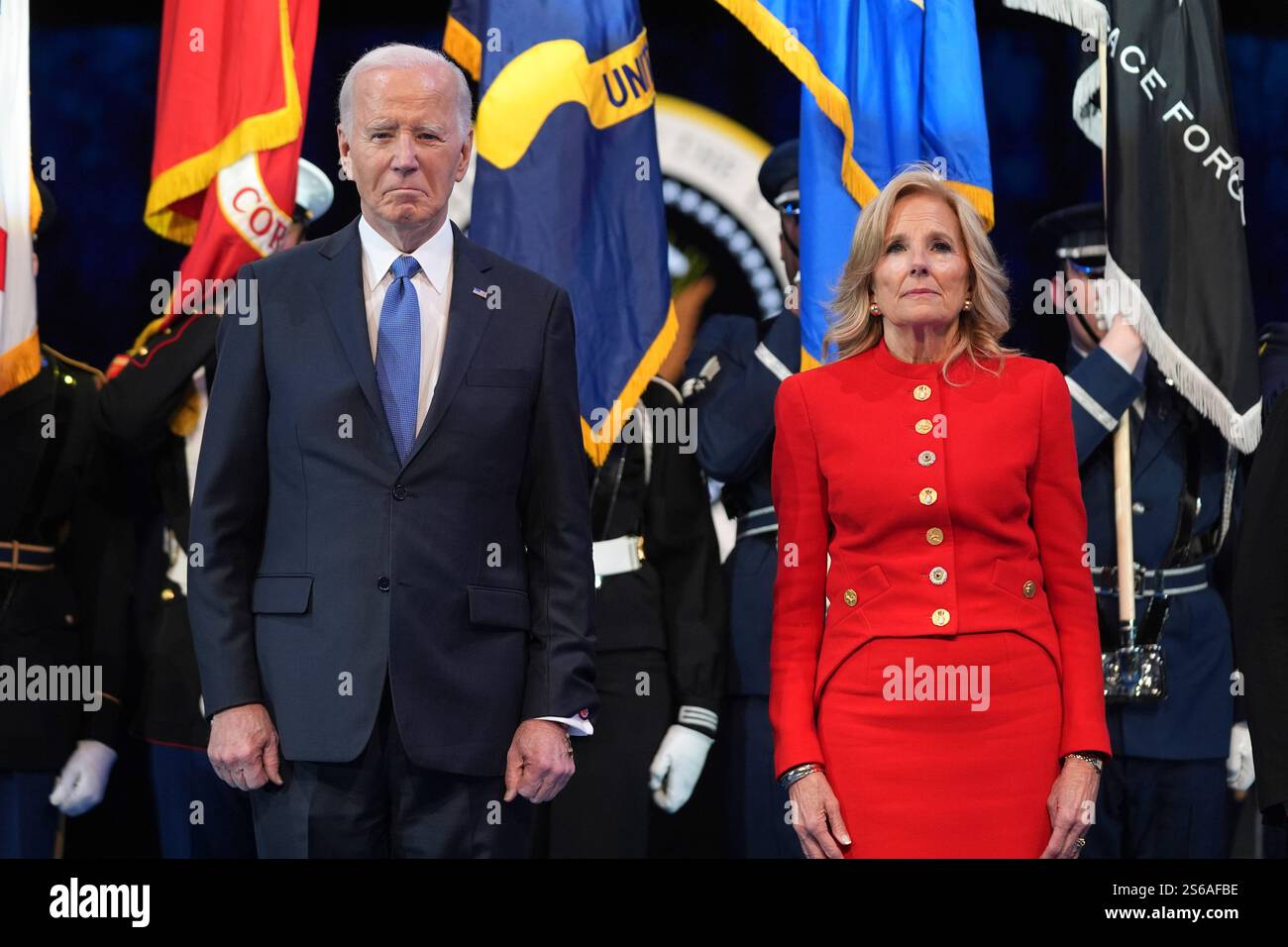 President Joe Biden, left, and first lady Jill Biden stand during a ...