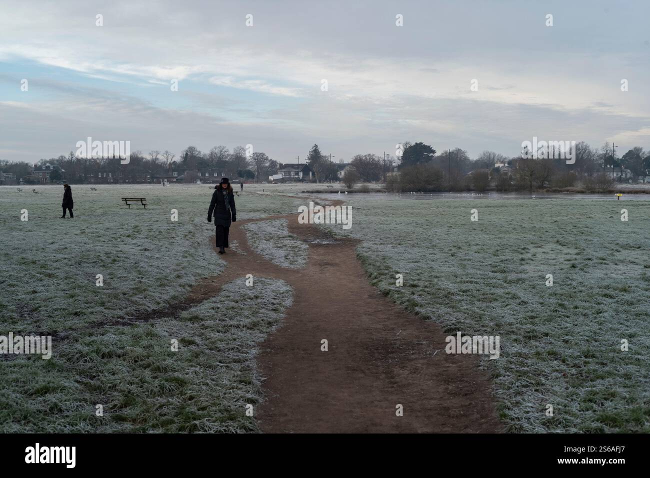 A frozen Rushmere Pond, during freezing temperatures on Wimbledon ...