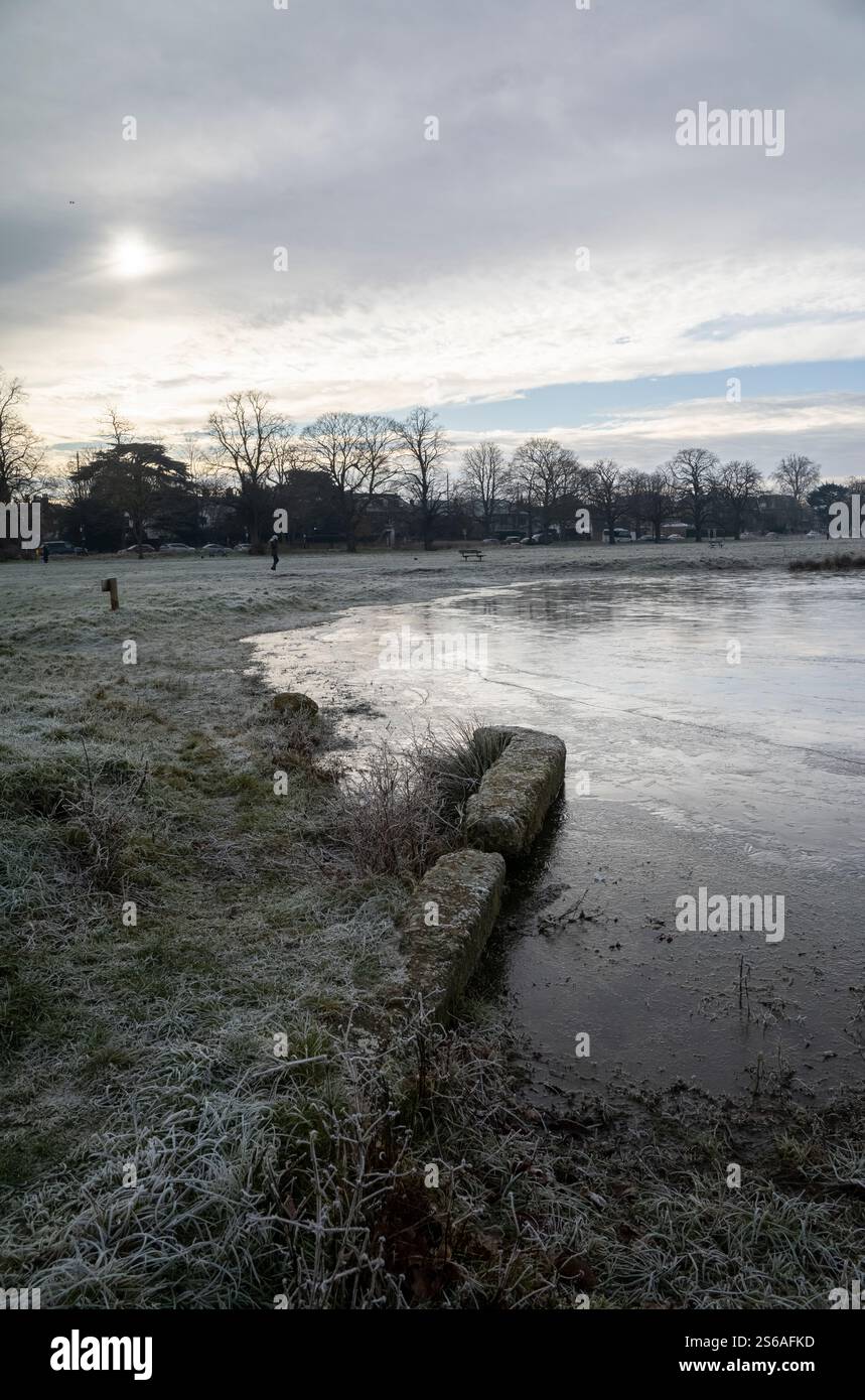 A frozen Rushmere Pond, during freezing temperatures on Wimbledon ...