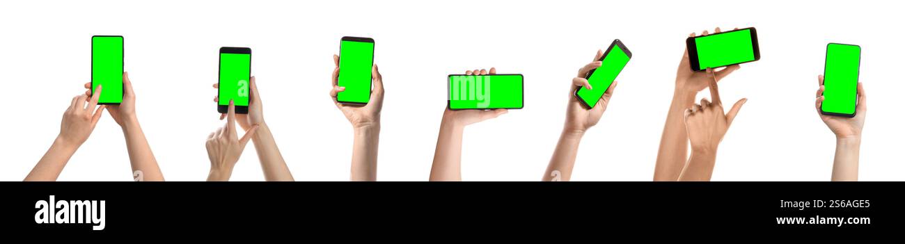 Set of hands holding mobile phones with green screen on white ...