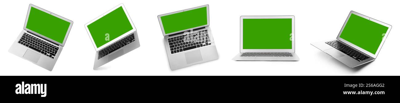 Set of laptops with green screen on white background Stock Photo - Alamy