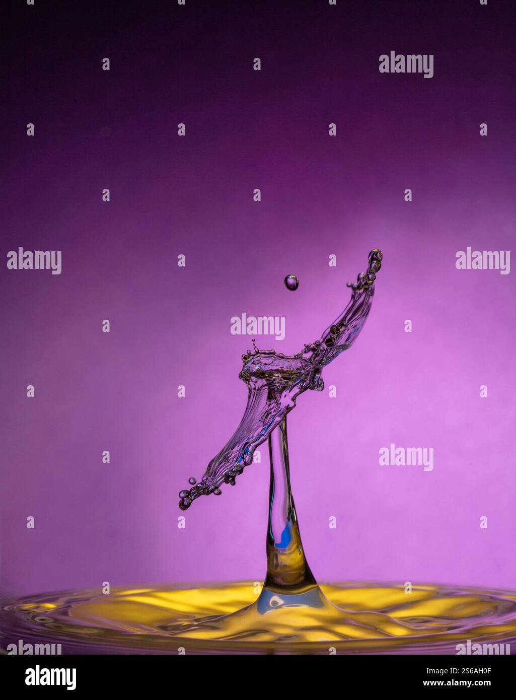 Arresting, ethereal, colour infused, imaginative water collision, macro ...