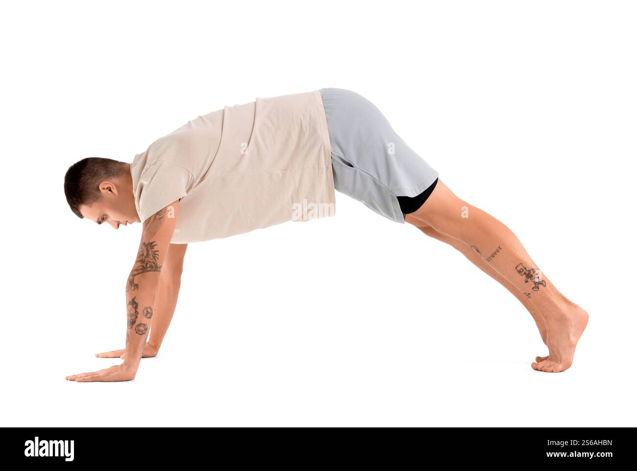 Man practicing yoga doing Cut Out Stock Images & Pictures - Alamy