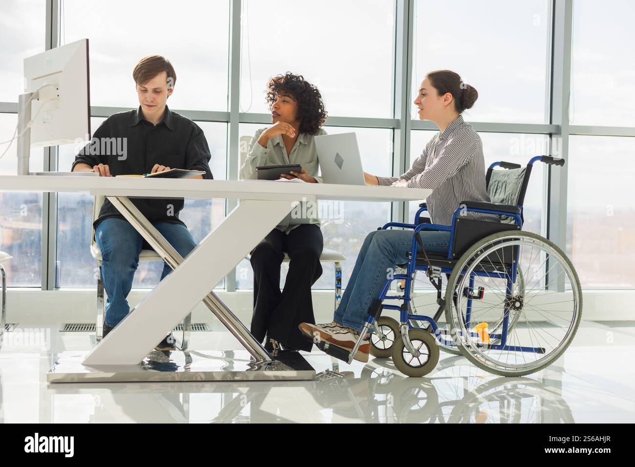 Teamwork brainstorm. Diverse multiracial colleagues woman in chair for ...