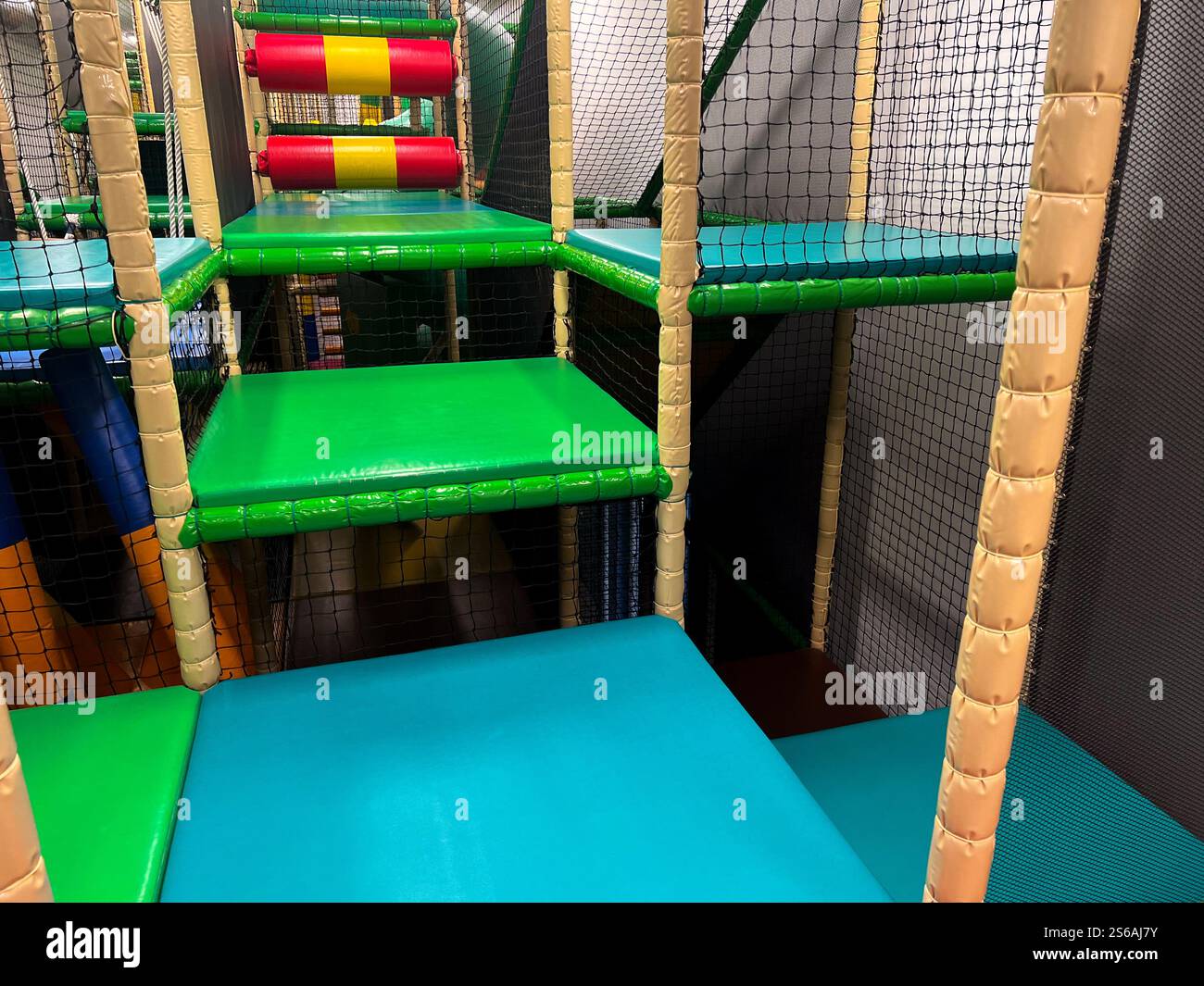 Colorful fun indoor playground area for children Stock Photo - Alamy