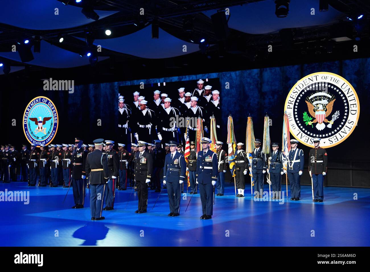Members of the military stand during a Department of Defense Commander ...