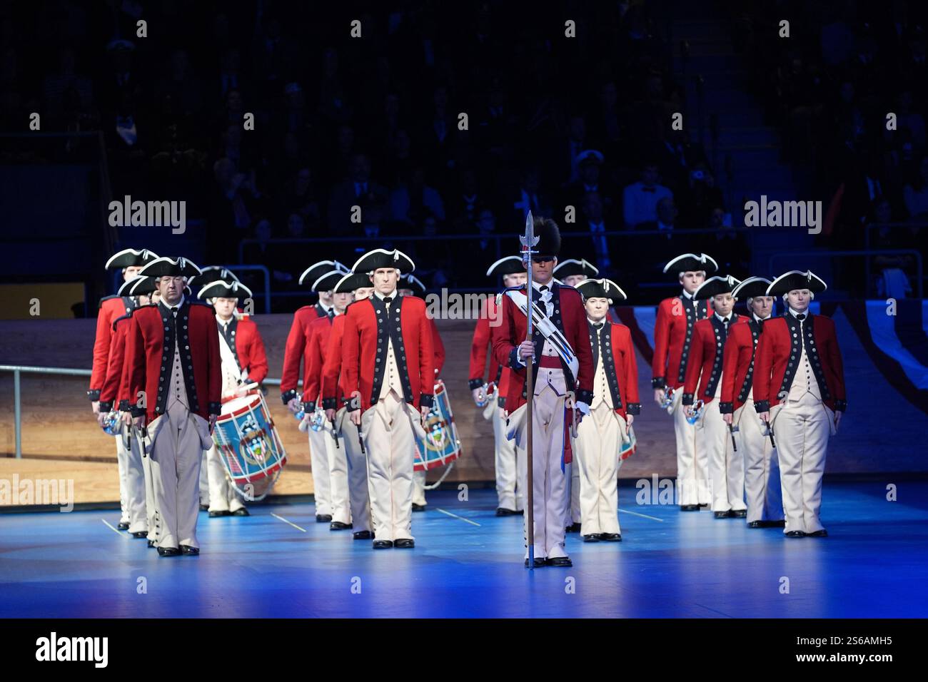 The United States Army Old Guard Fife and Drum Corps stands during a ...