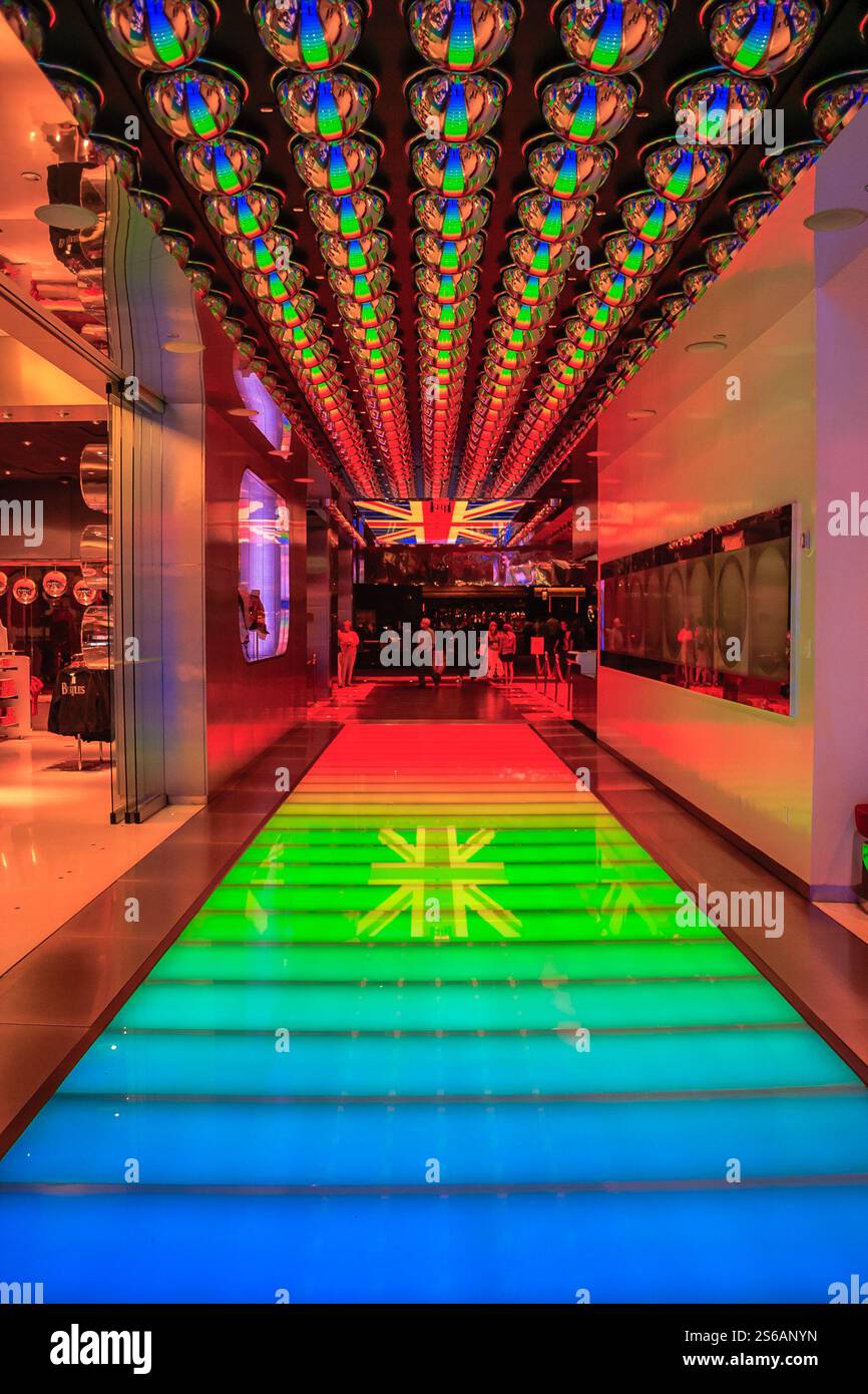 A colorful walkway with a British flag on it. The walkway is lit up ...