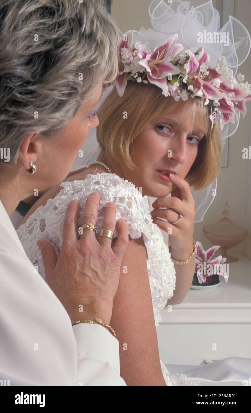 anxious bride with her mother on her wedding day Stock Photo - Alamy
