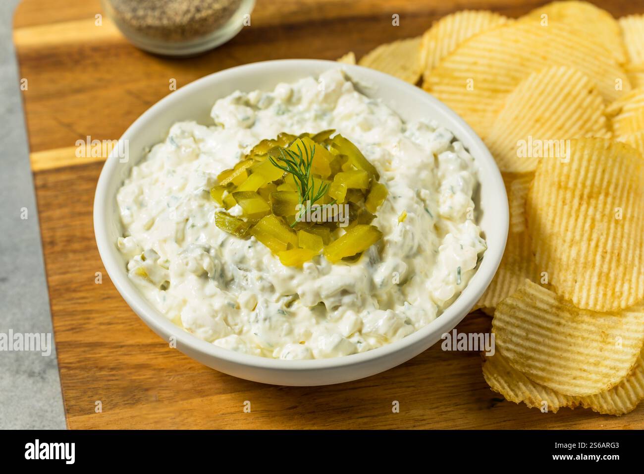 Creamy Pickle Dip with Mayo for an Appetizer with Potato Chips Stock ...