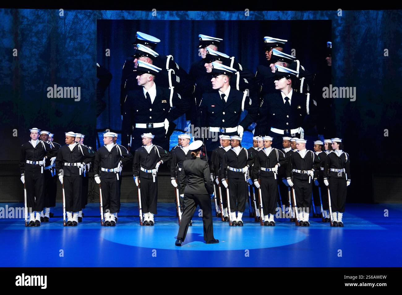 Members of the military stand during a Department of Defense Commander ...