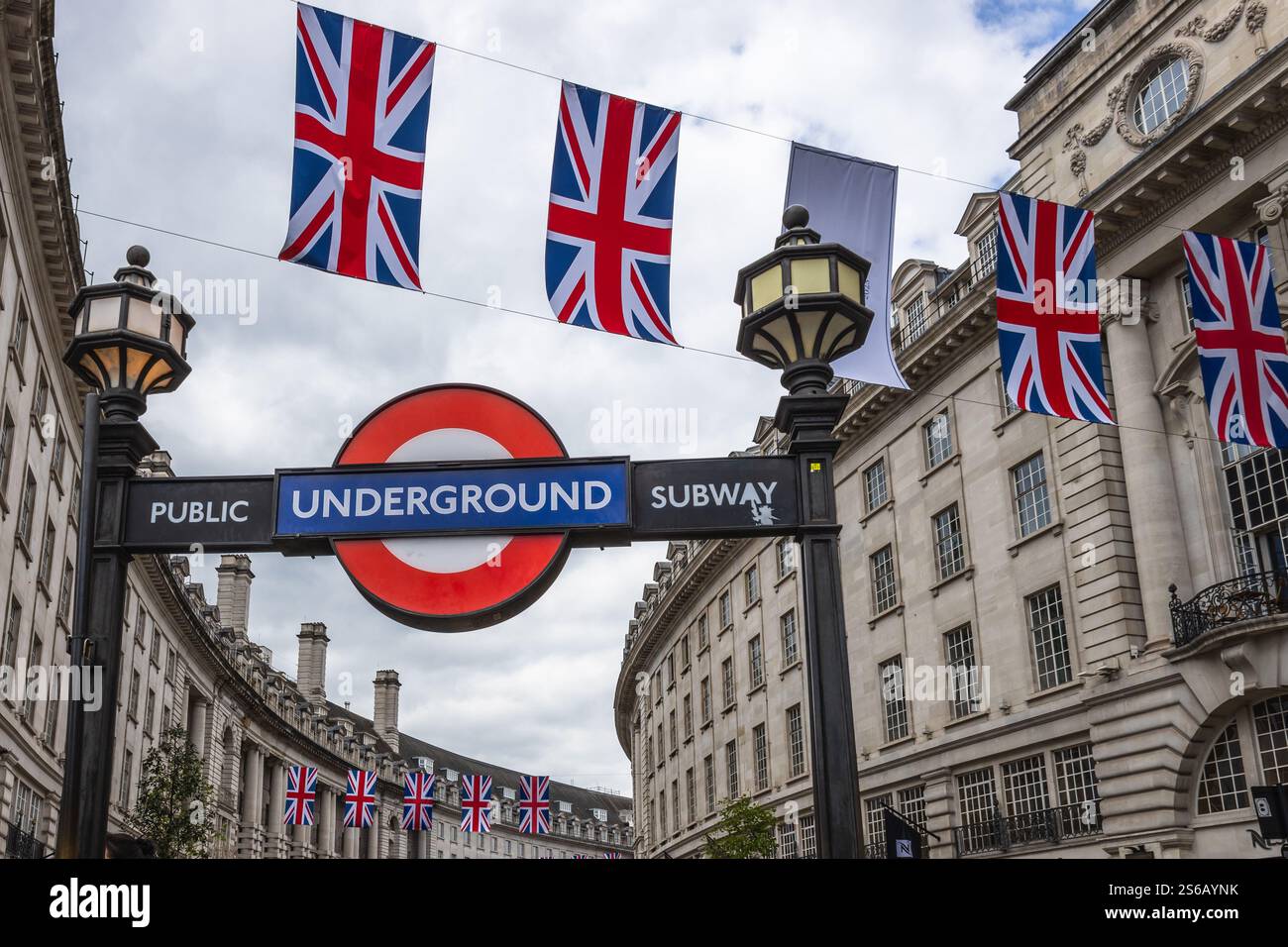 London Underground Sign and Union Jack Flags: City Scene in the UK ...