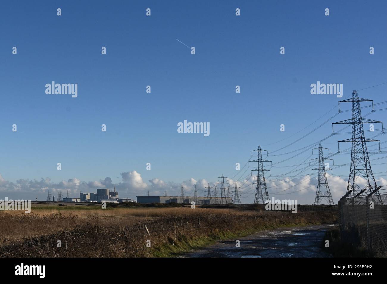 electricity pylons leading to Dungeness nucleur power station Stock ...