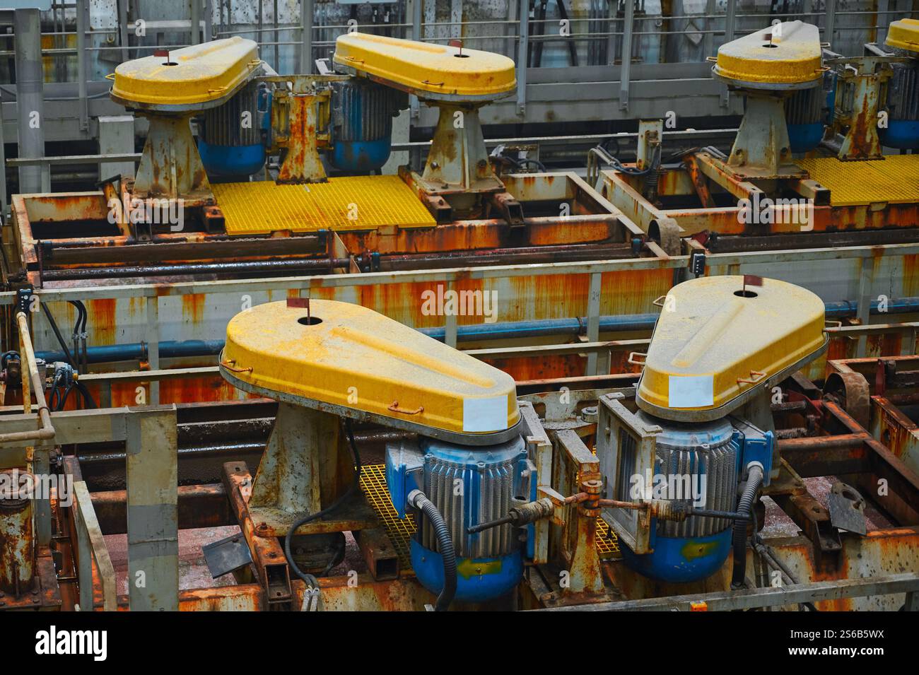 Production line with baths of floatation machine at factory Stock Photo ...