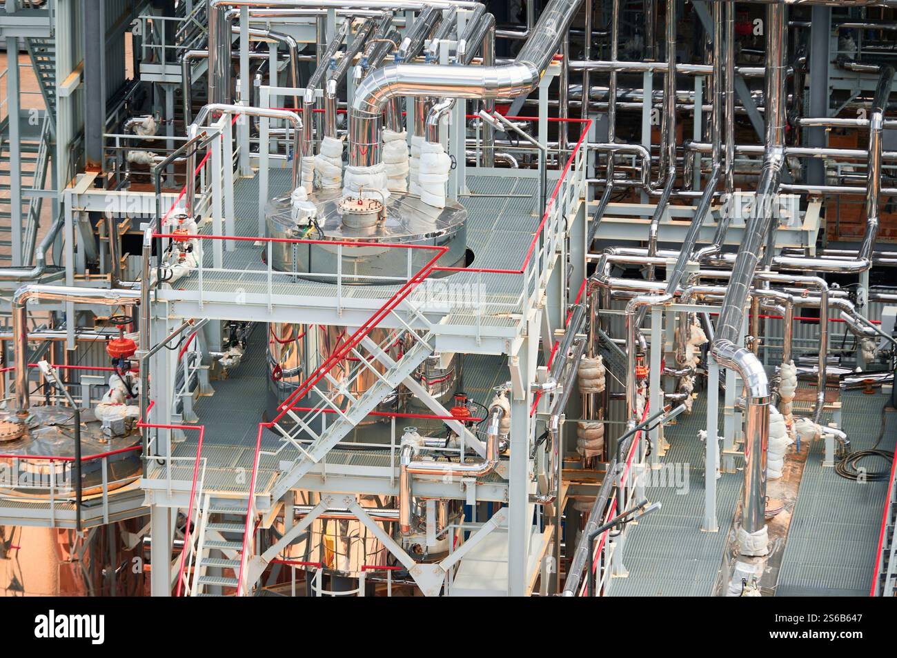 Detailed view of pipelines and structures in a chemical processing ...