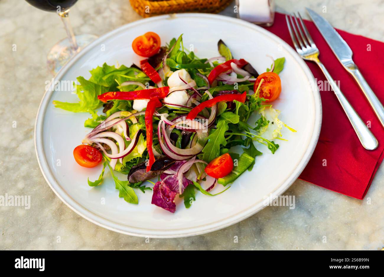 Fresh vegetable salad with mini mozzarella pearls Stock Photo - Alamy