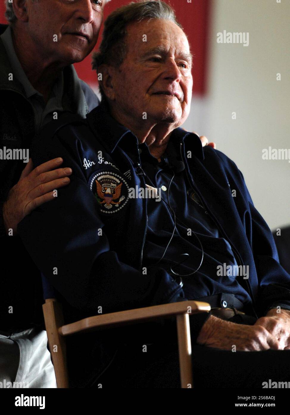 George Bush senior and junior during a ceremony aboard the aircraft ...